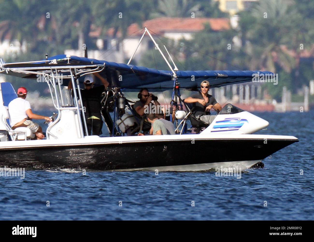 EXCLUSIVE!! Pop music superstar Enrique Iglesias takes to the waves and ...
