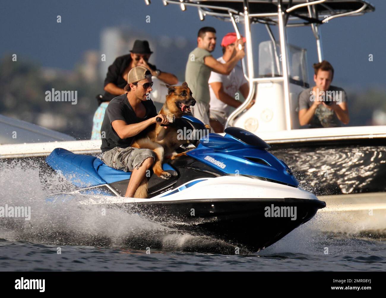 EXCLUSIVE!! Pop music superstar Enrique Iglesias takes to the waves and ...