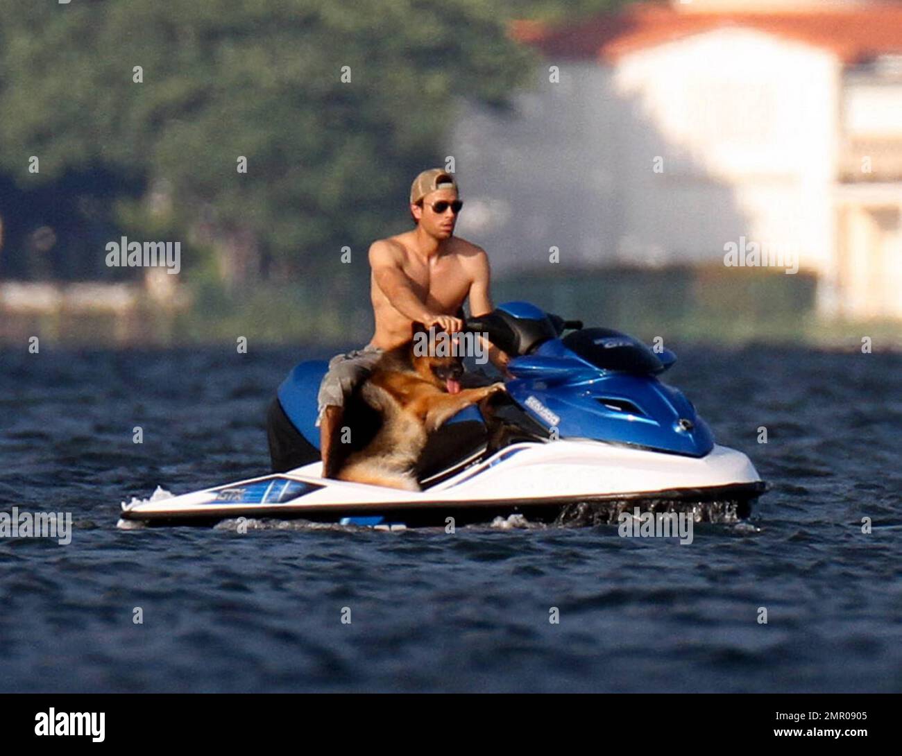 EXCLUSIVE!! Pop music superstar Enrique Iglesias takes to the waves and ...