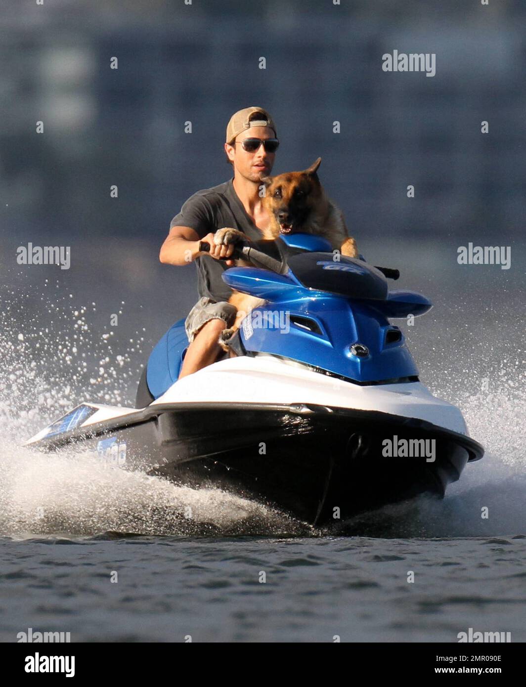 EXCLUSIVE!! Pop music superstar Enrique Iglesias takes to the waves and ...