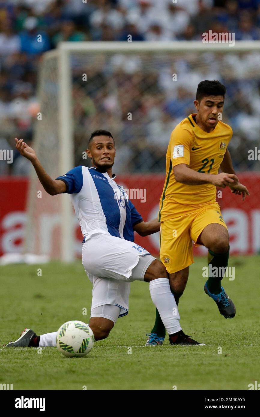 Australia's Massimo Luongo, right, fights for the ball with Honduras ...