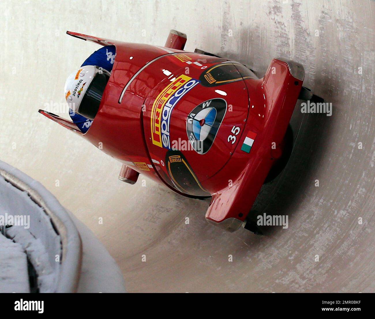 Patrick Baumgartner of Italy takes a curve at the World Cup bobsled ...
