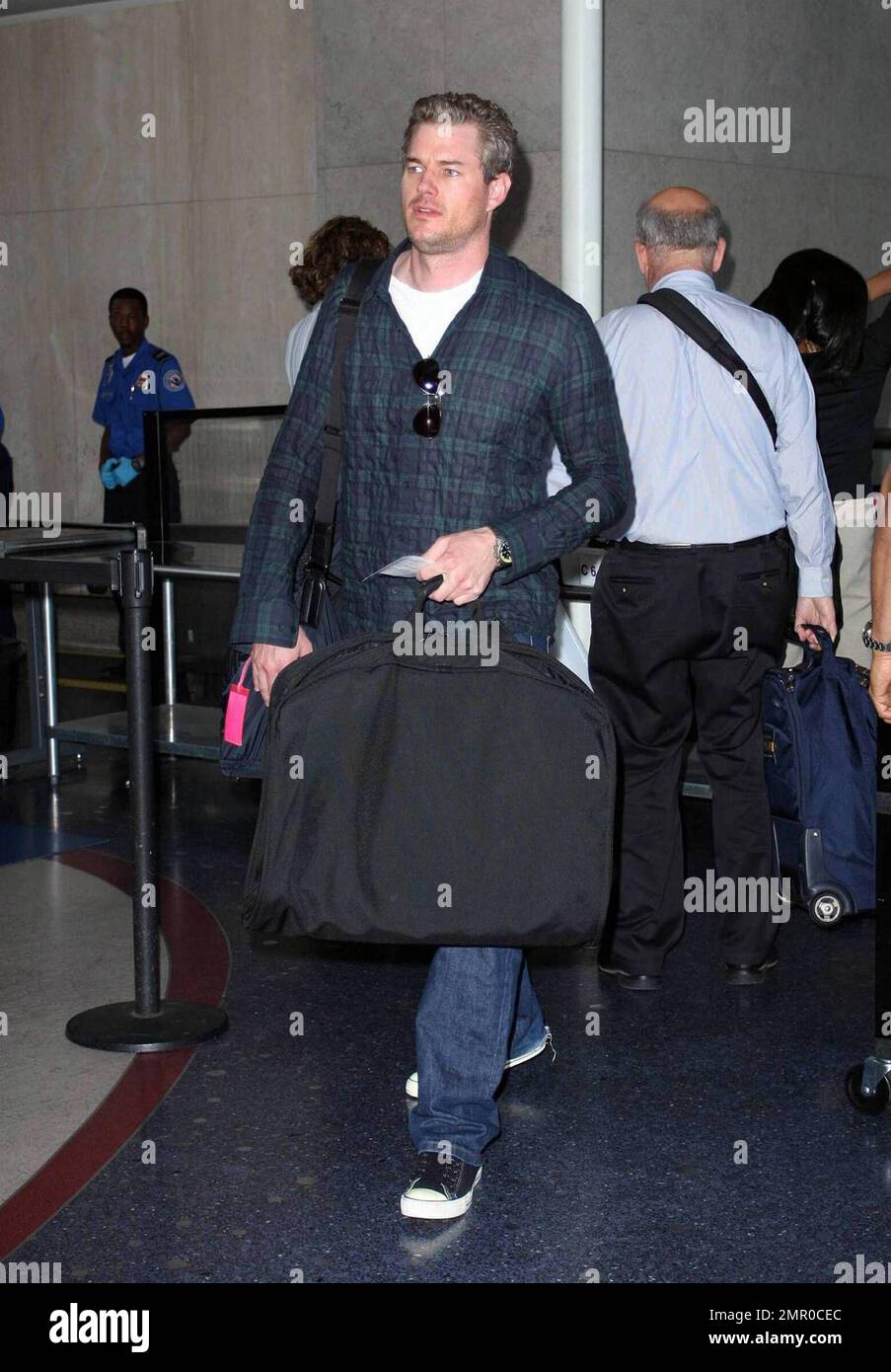 Eric Dane was seen checking in for a flight out of LAX this morning ...