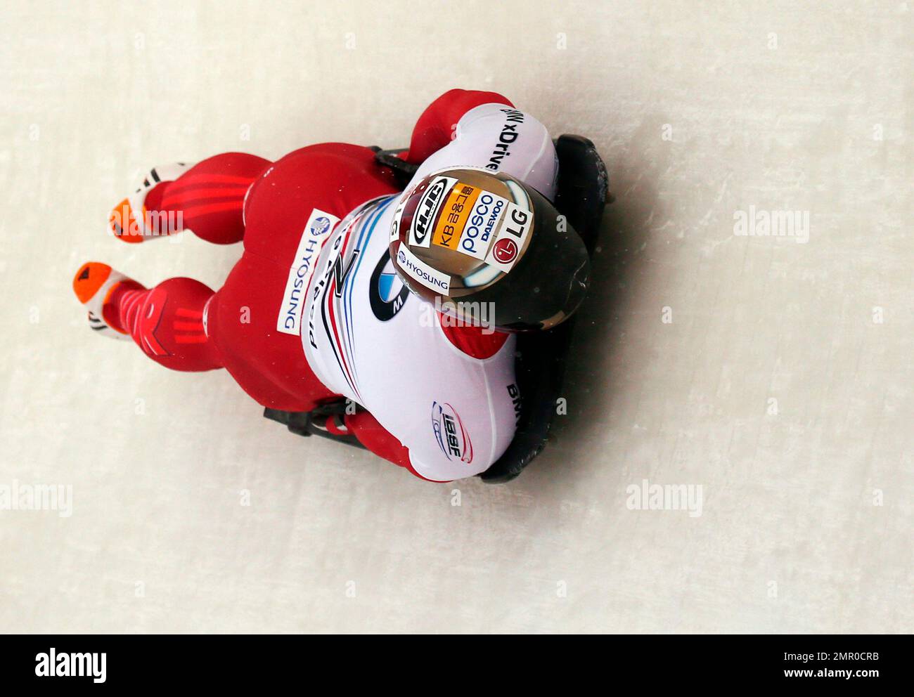 Sungbin Yun, of South Korea, rounds a curve at a World Cup skeleton ...