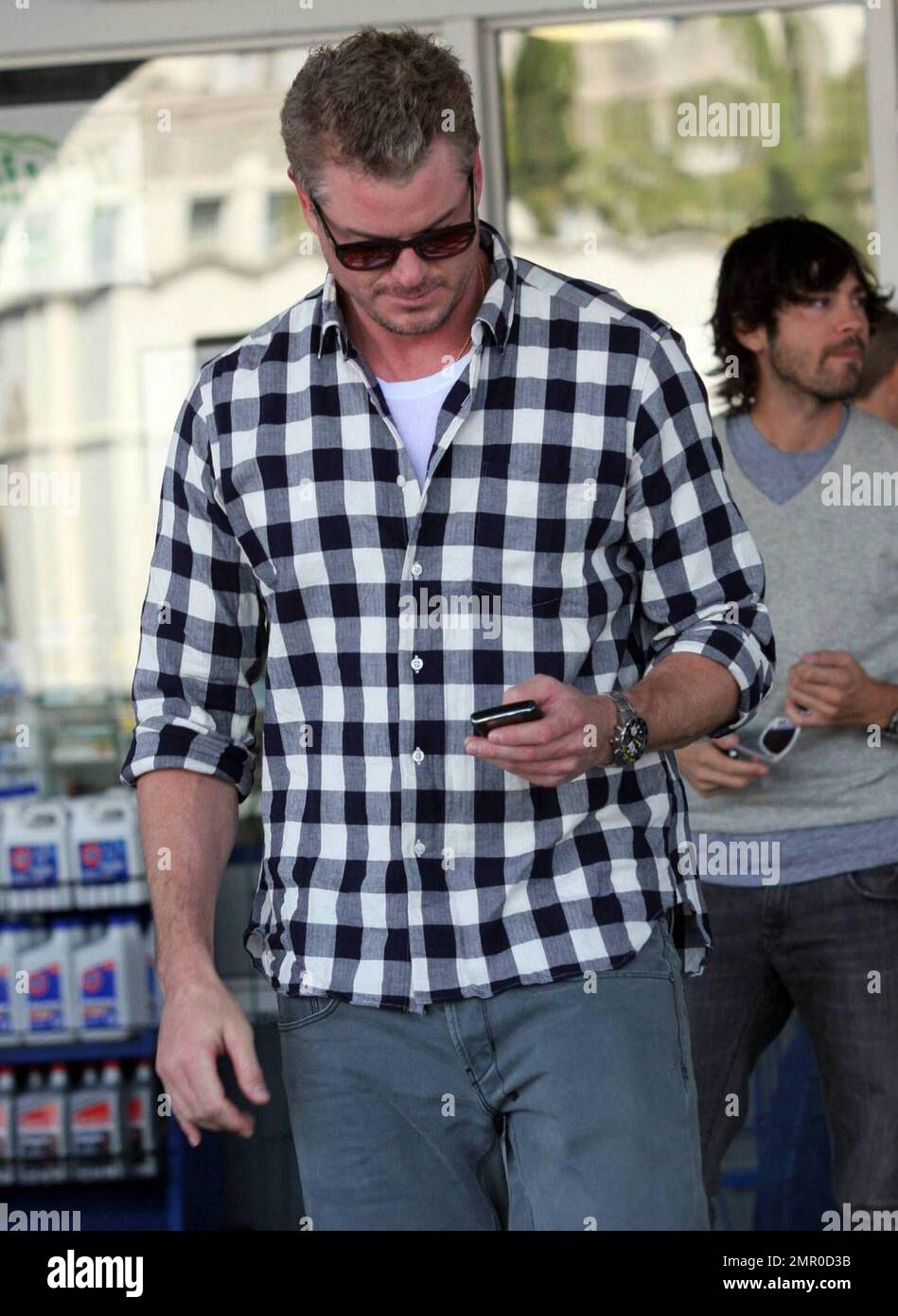 Eric Dane gasses up in Los Angeles, Ca. 10/6/09 Stock Photo - Alamy