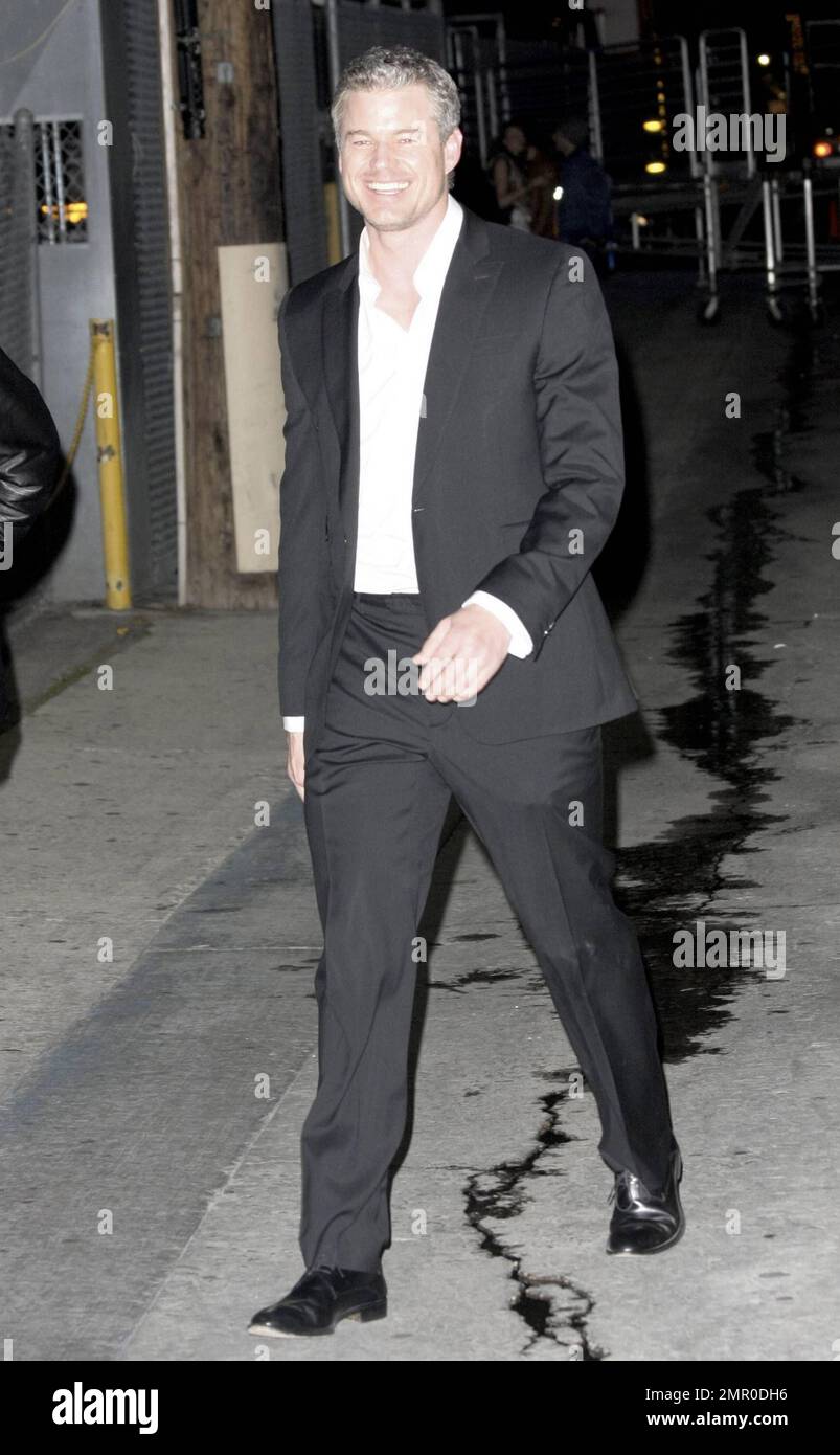 Eric Dane poses for photos and signs autographs as he leaves the ...