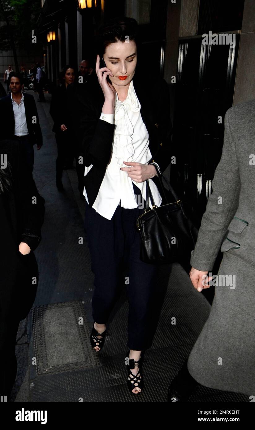 Supermodel Erin O'Connor chats on her cellphone as she arrives at The ...