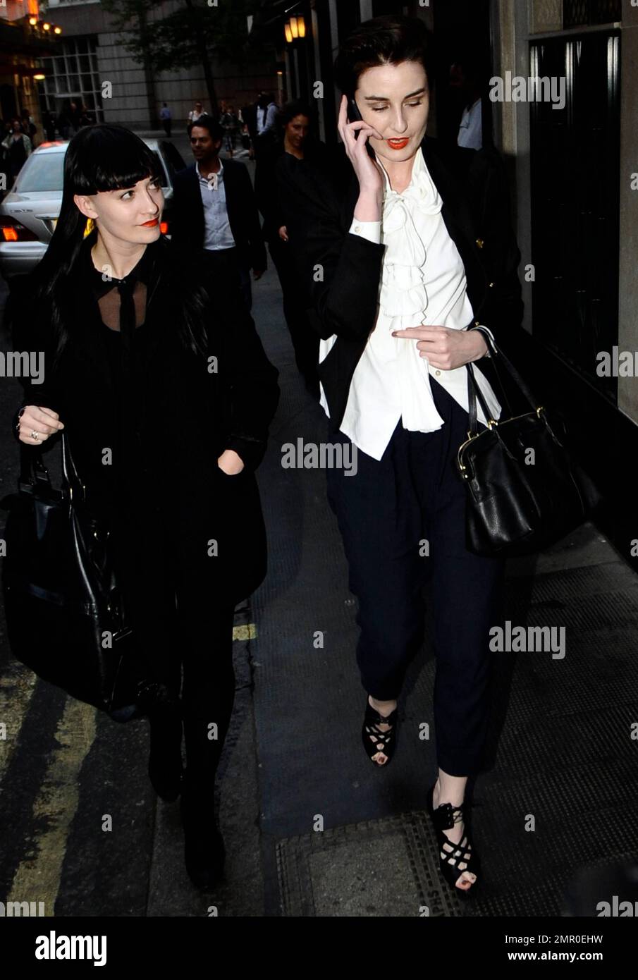 Supermodel Erin O'Connor chats on her cellphone as she arrives at The ...