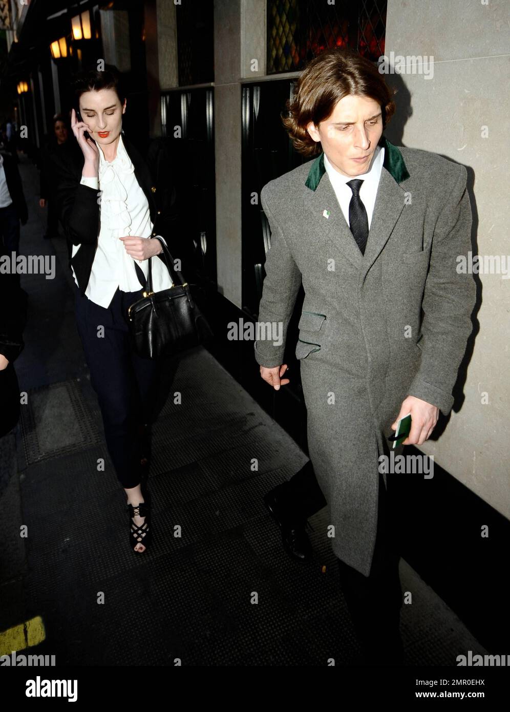 Supermodel Erin O'Connor chats on her cellphone as she arrives at The ...