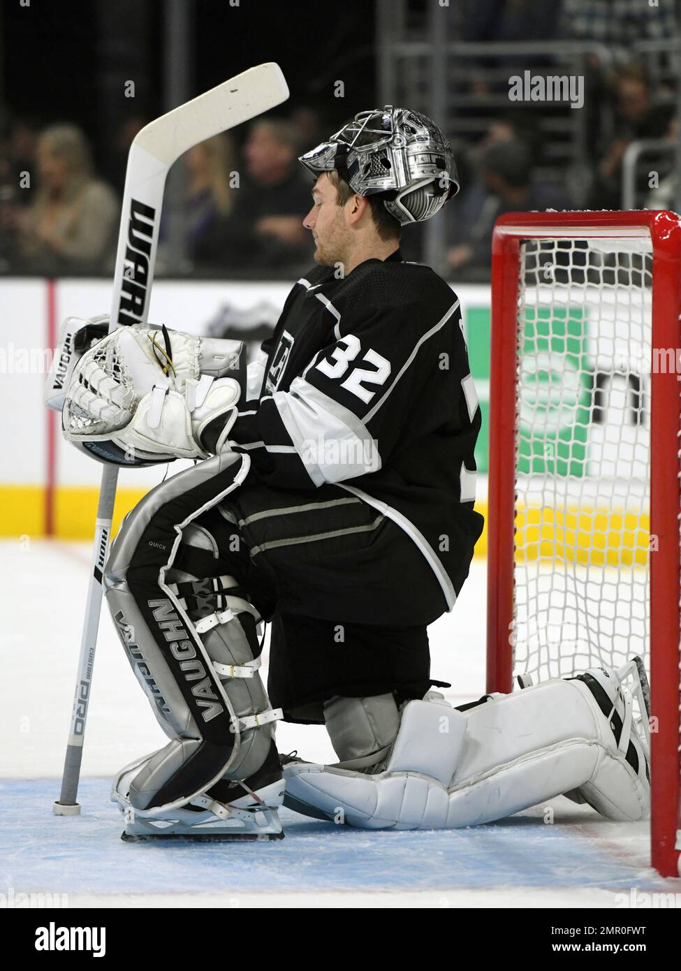 Los Angeles Kings goalie Jonathan Quick looks down after giving up four ...