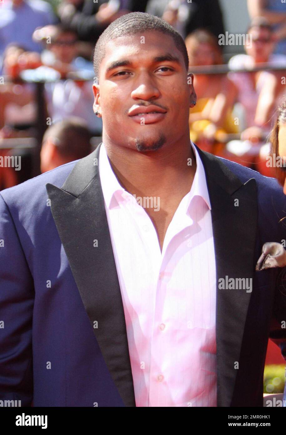 Larry English, outside linebacker for the San Diego Chargers, walks the ...