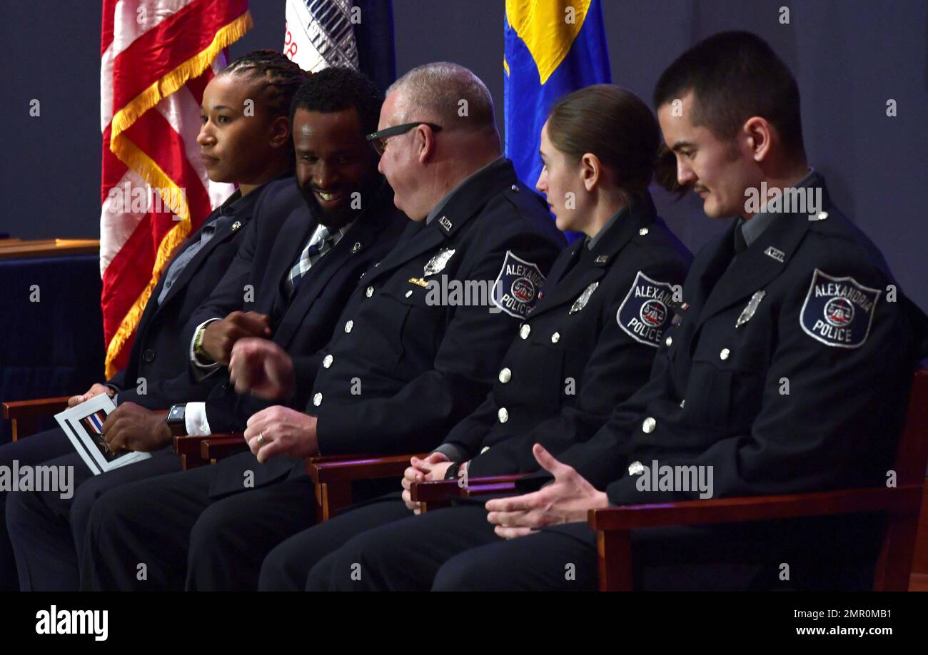 Capitol Police special agent David Bailey, second from left, gives a ...