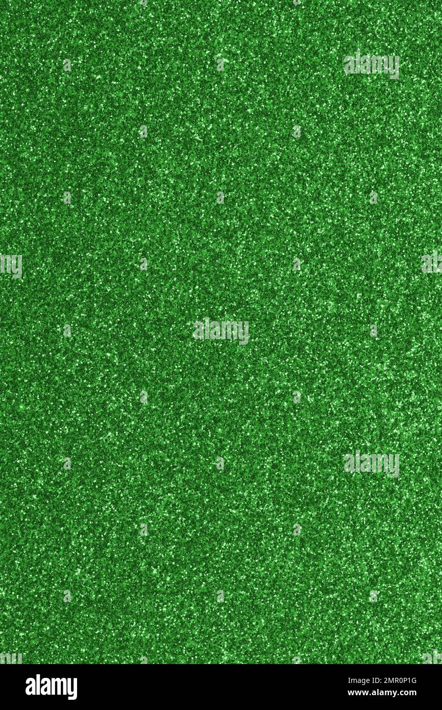 GREEN shimmering glitter material background with glowing effects Stock ...