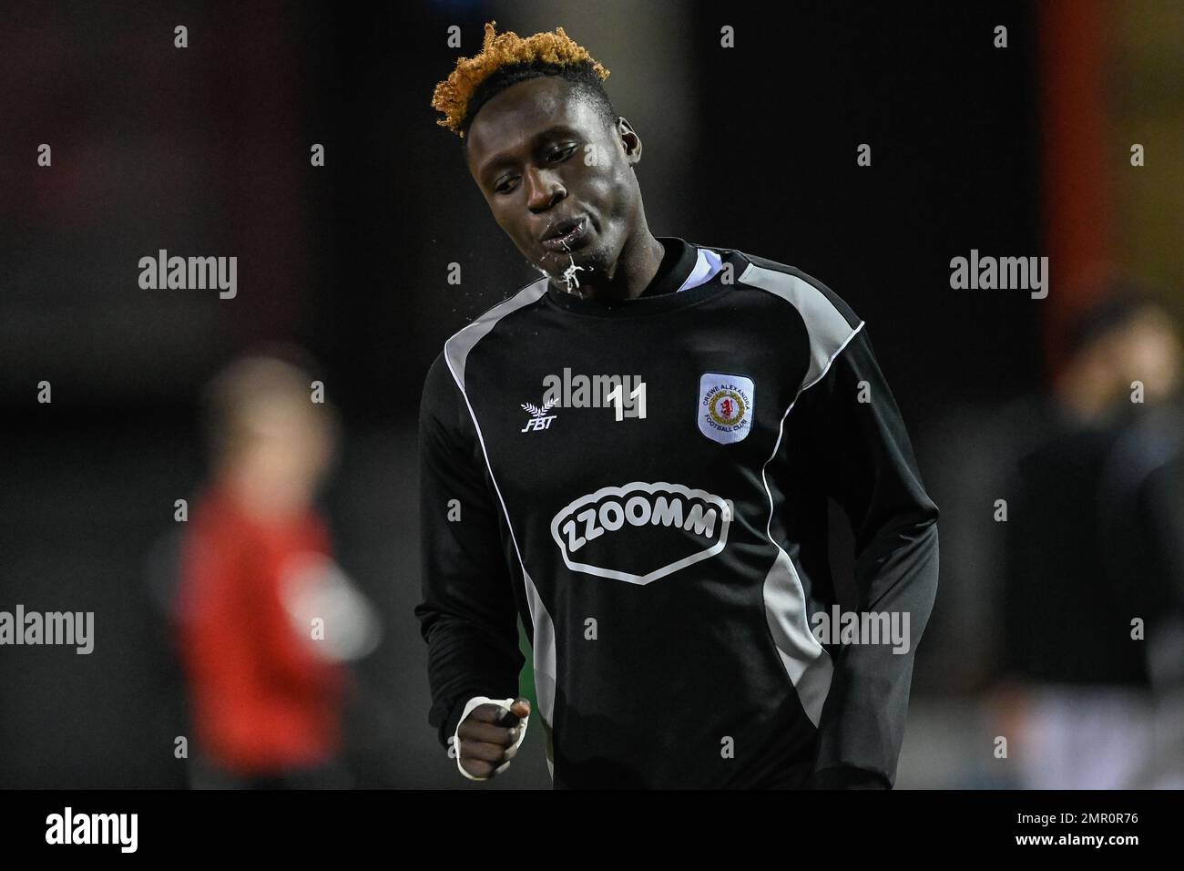 Daniel Agyei #11 of Crewe Alexandra warms up during the Sky Bet League ...