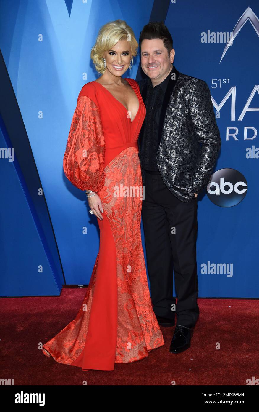 Allison Alderson, left, and Jay DeMarcus arrive at the 51st annual CMA ...
