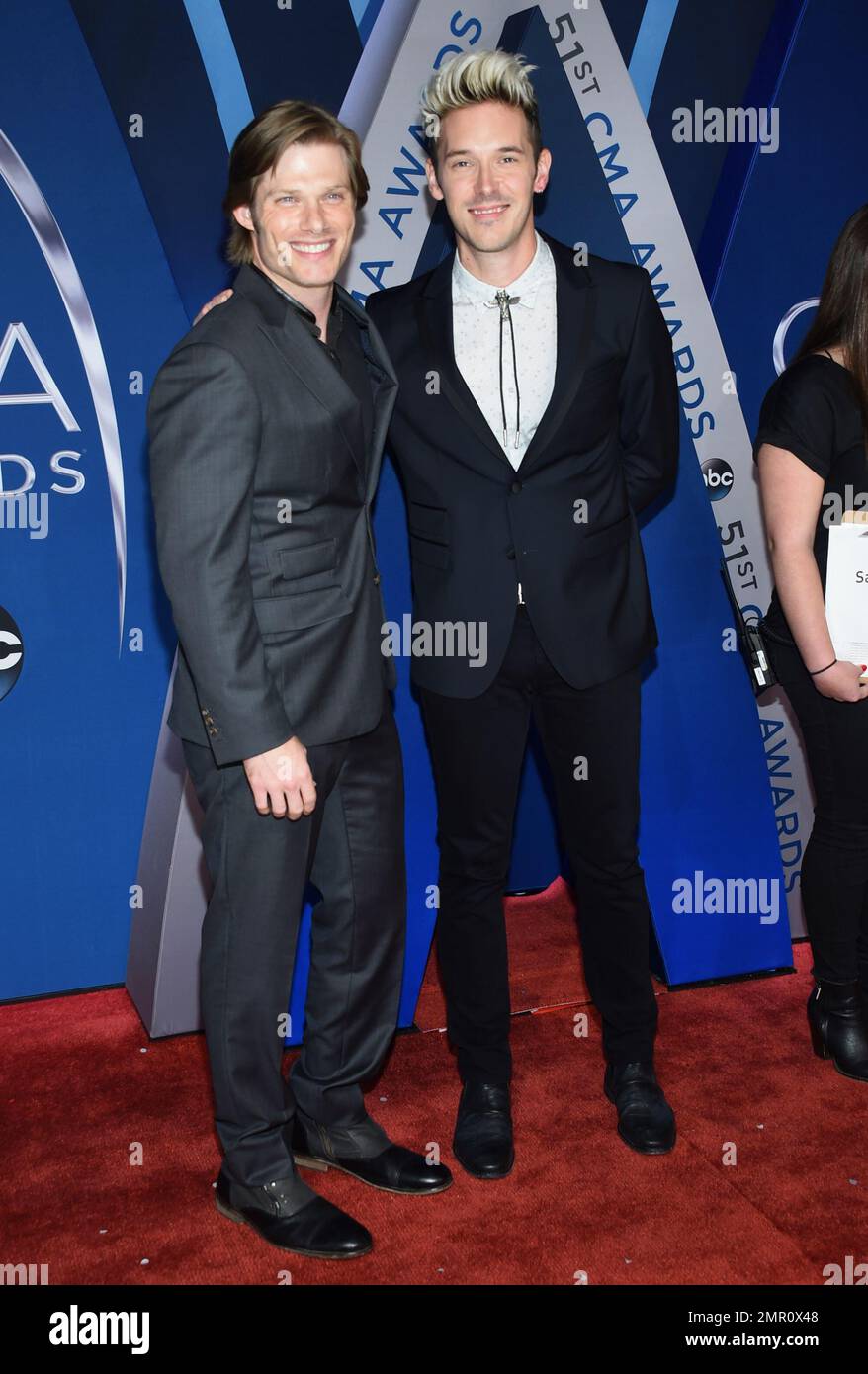 Chris Carmack, left, and Sam Palladio arrive at the 51st annual CMA ...