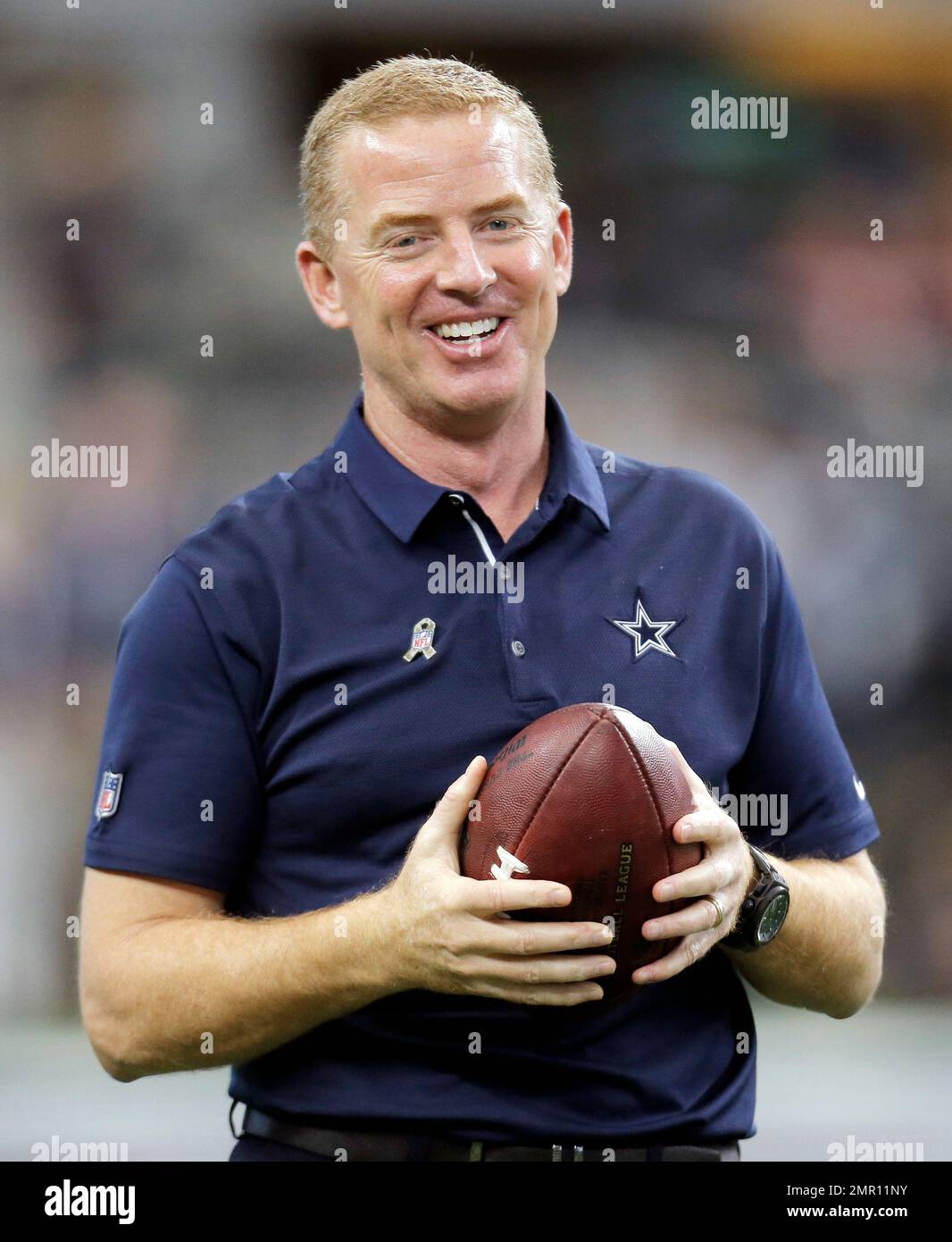 Dallas Cowboys head coach Jason Garrett wears a Salute to Service pin ...
