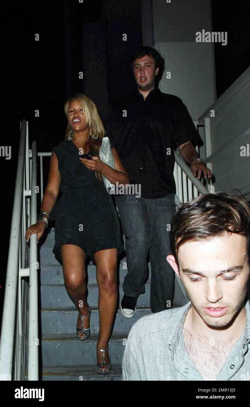 Eve looked a little worse for wear as she left My House with two men ...