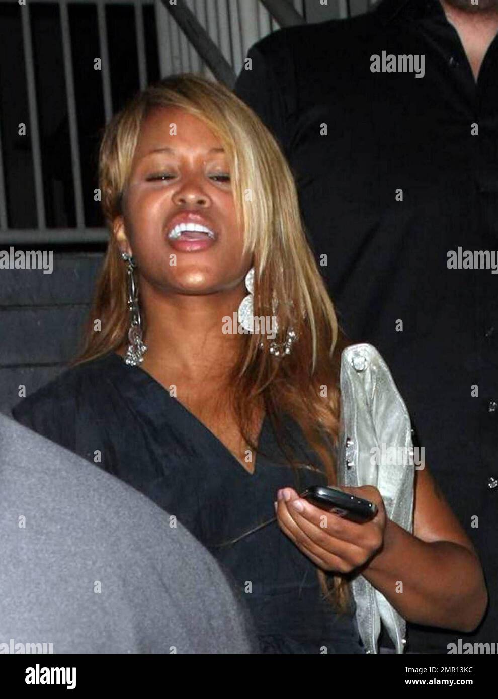 Eve looked a little worse for wear as she left My House with two men ...