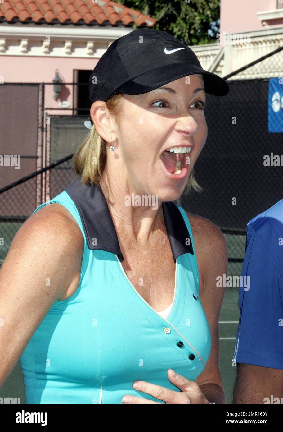 Tennis legend Chris Evert warms up prior to the start of the Chris ...