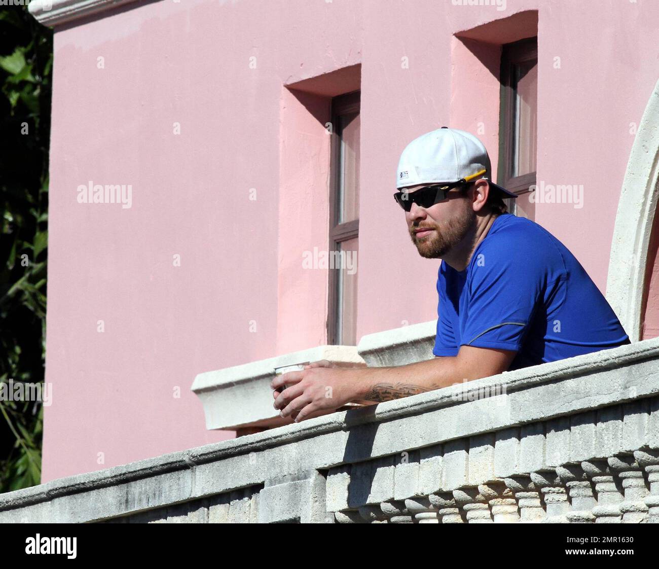 American Idol winner David Cook watches warm ups prior to the start of ...