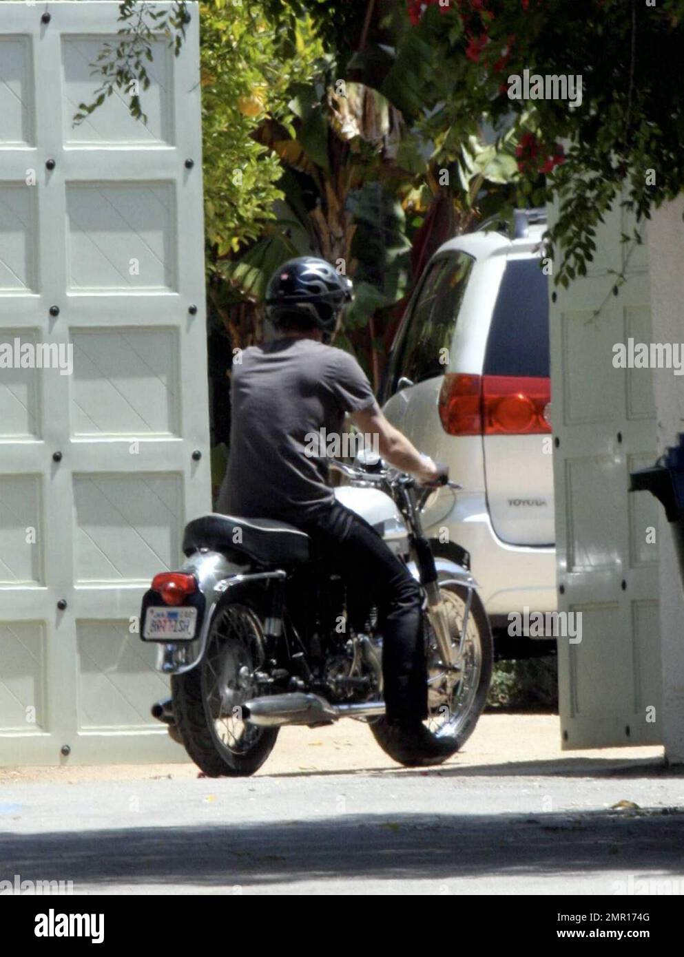 Exclusive!! Ewan McGregor arrives home after spending some time riding ...