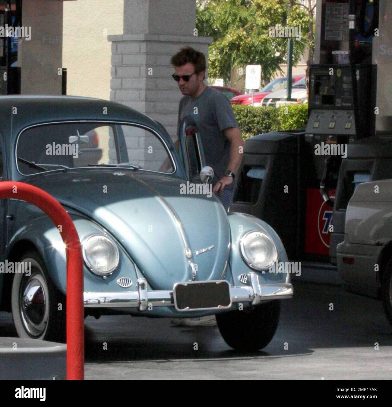 Exclusive!! Ewan McGregor stops at a gas station in a classic ...