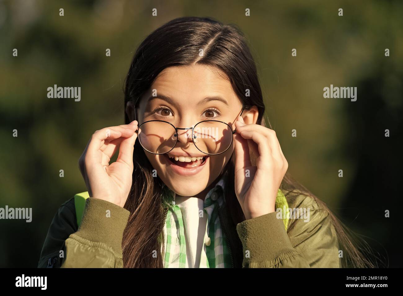 amazed kid with backpack wear glasses. back to school Stock Photo - Alamy