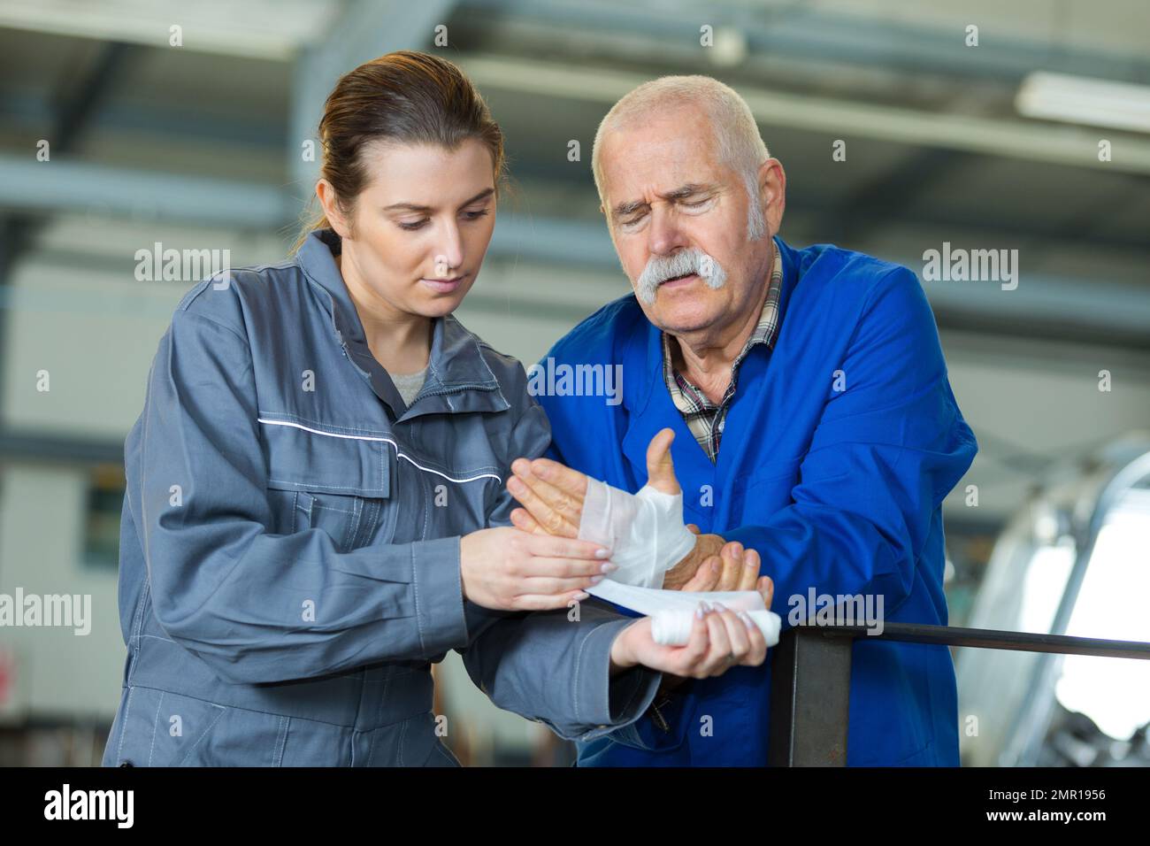 Rushing to help hi-res stock photography and images - Alamy