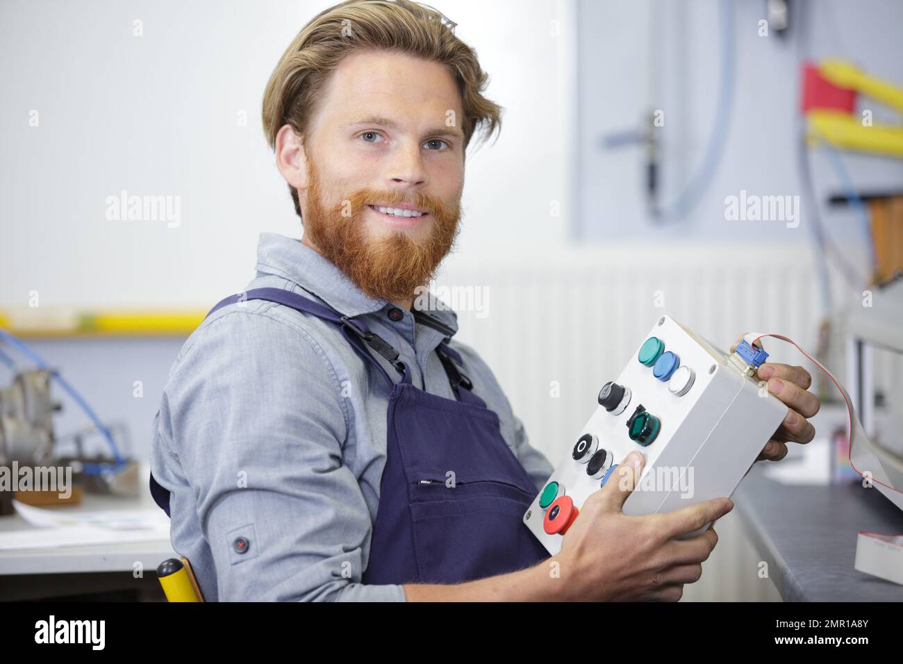 Technician holding control pad hi-res stock photography and images - Alamy