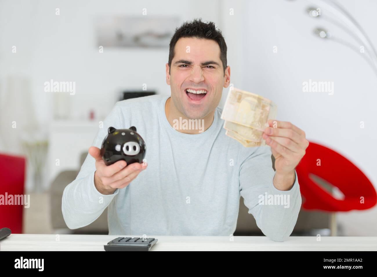 happy man in smiling and holding dollar banknote Stock Photo - Alamy