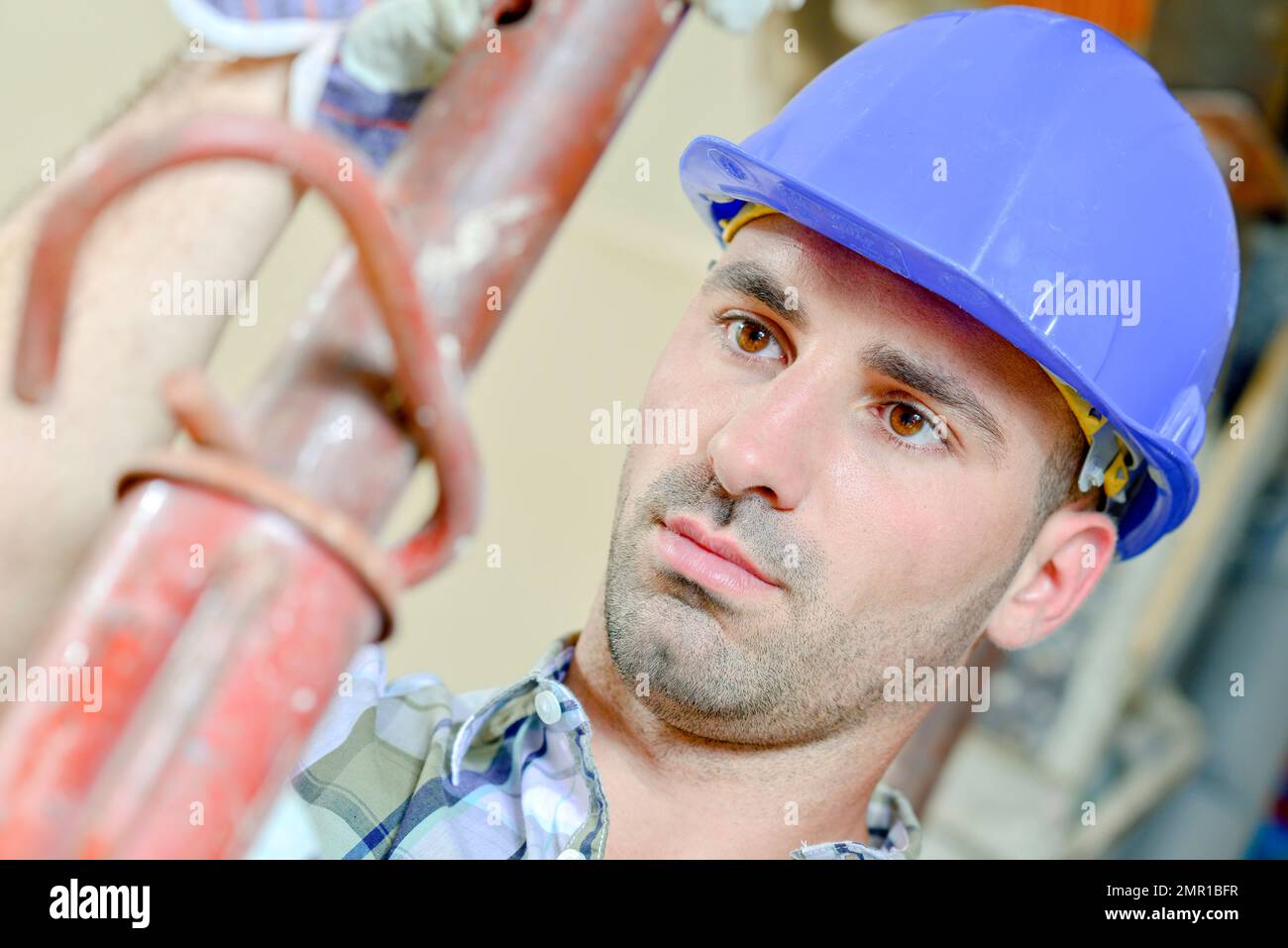 Construction worker placing a stay Stock Photo - Alamy