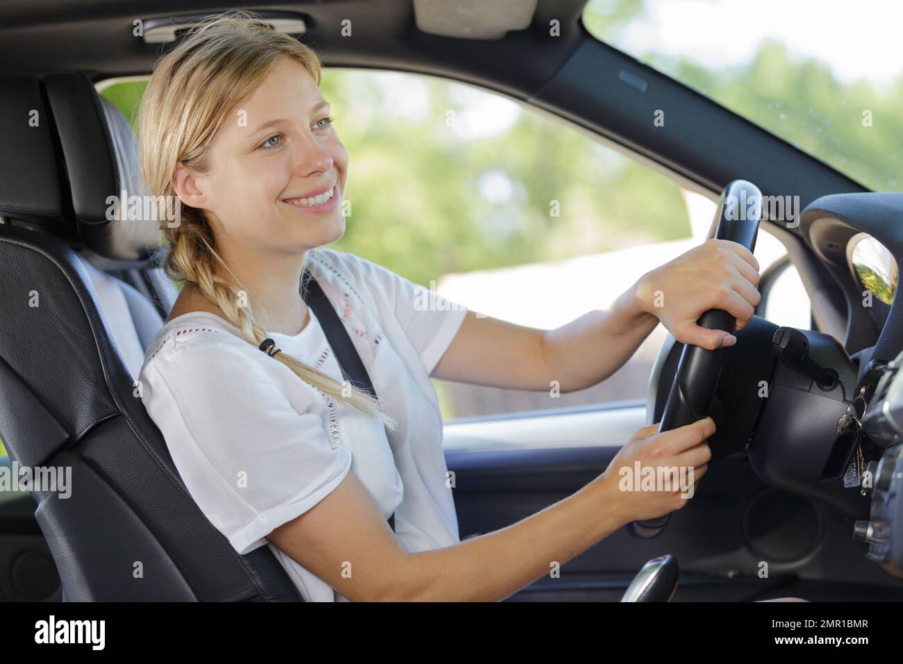 Happy woman buyer taking car hi-res stock photography and images - Alamy