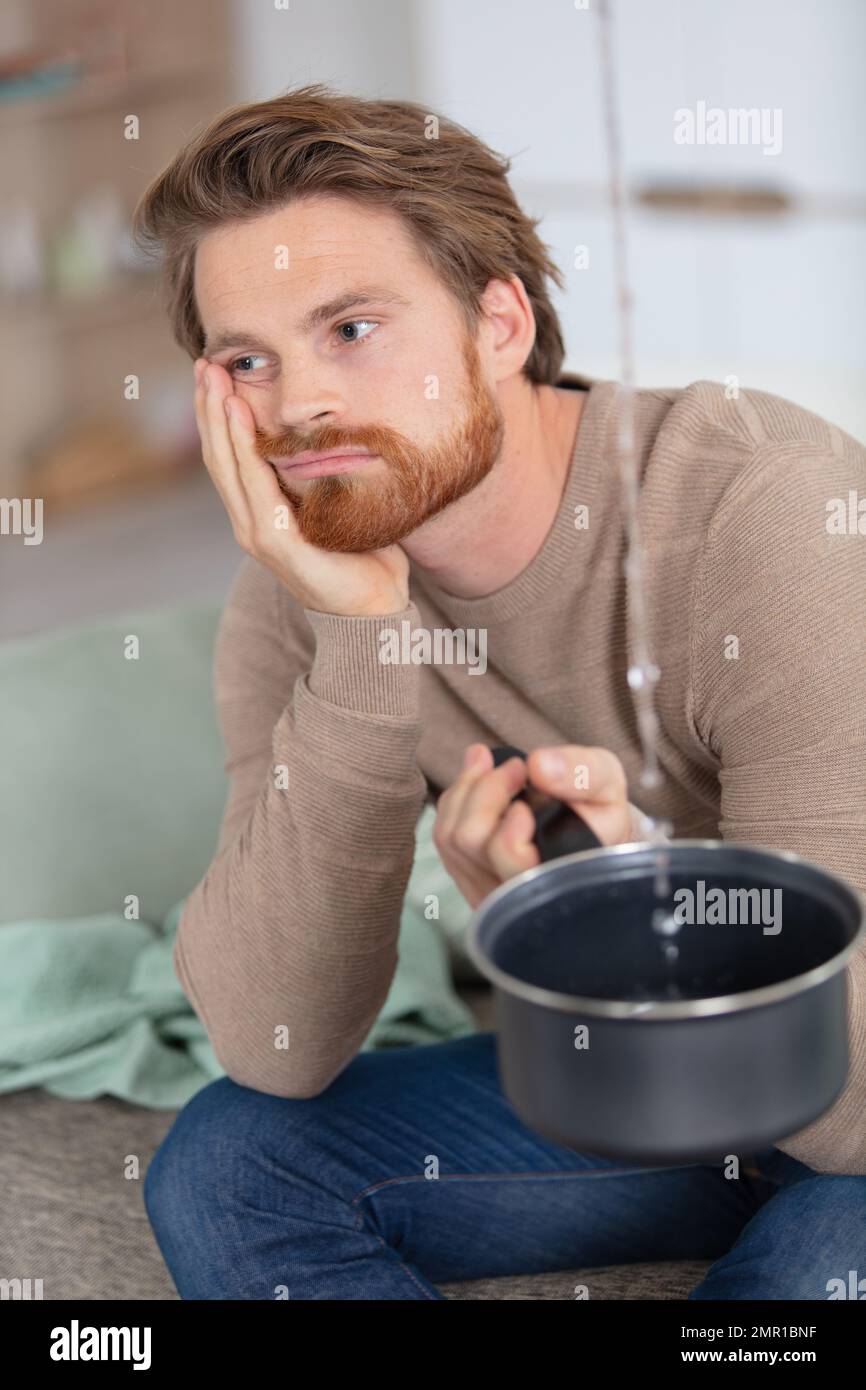 Water bucket home drip hi-res stock photography and images - Alamy