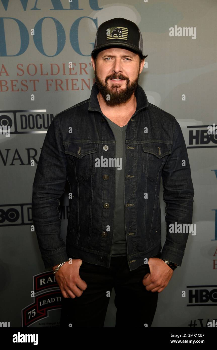AJ Buckley poses at the premiere of the film "War Dog: A Soldier's Best ...