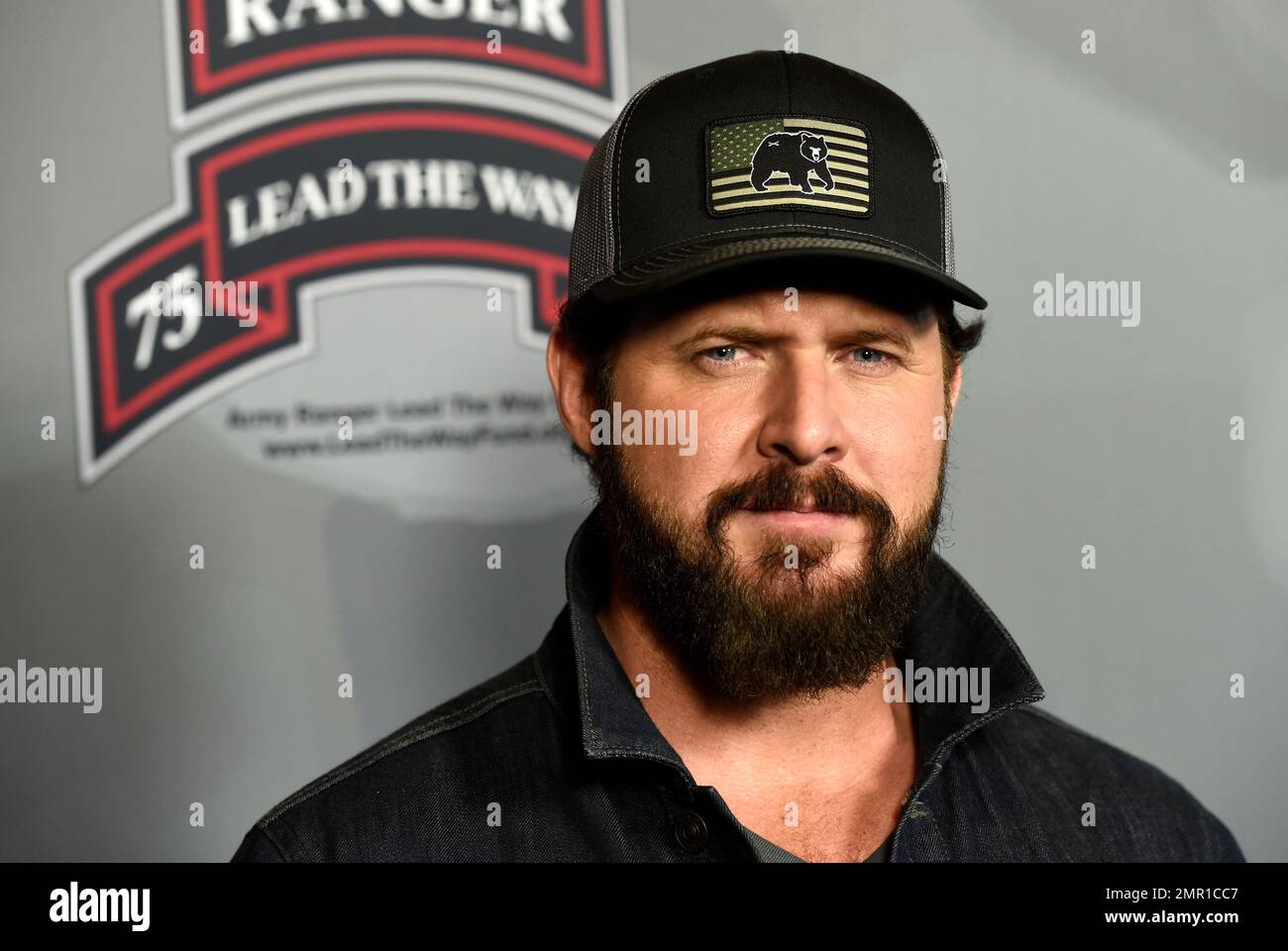 AJ Buckley poses at the premiere of the film "War Dog: A Soldier's Best ...