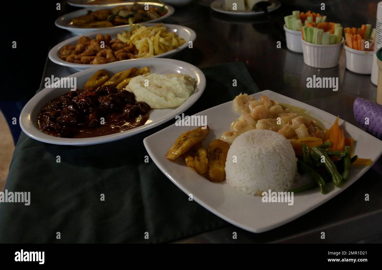 In this Nov. 5, 2017 photo, meals sit on square and circular plates at ...