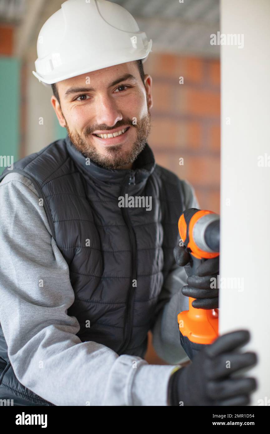 portrait of young foreman in room Stock Photo - Alamy