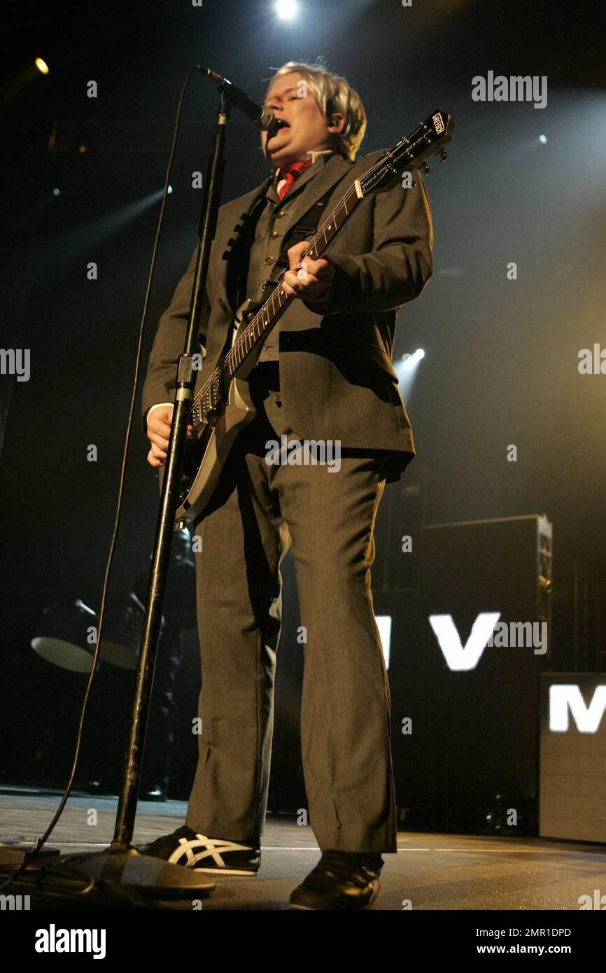 Fall Out Boy appear to be made up to look beaten up as they perform at ...
