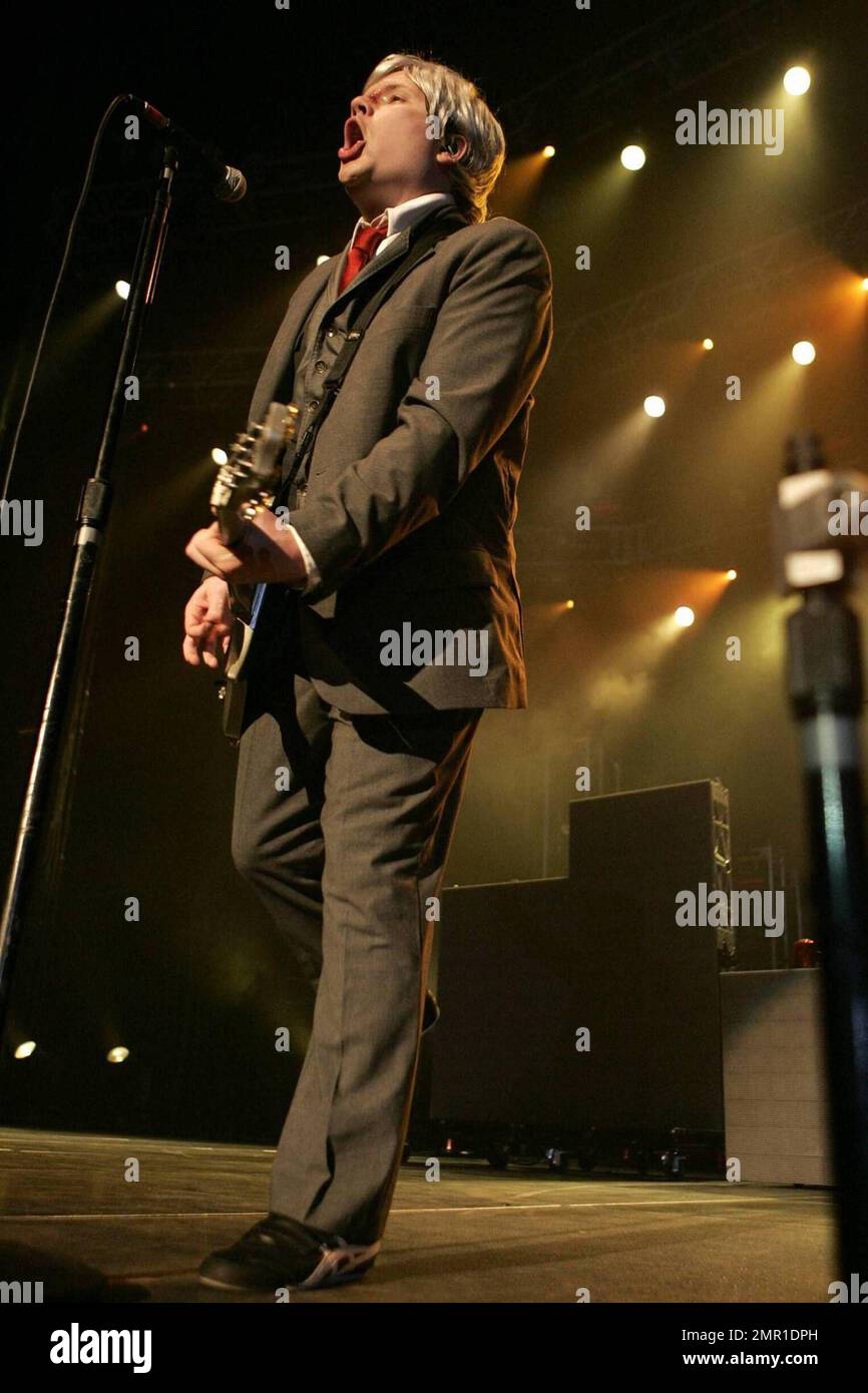 Fall Out Boy appear to be made up to look beaten up as they perform at ...