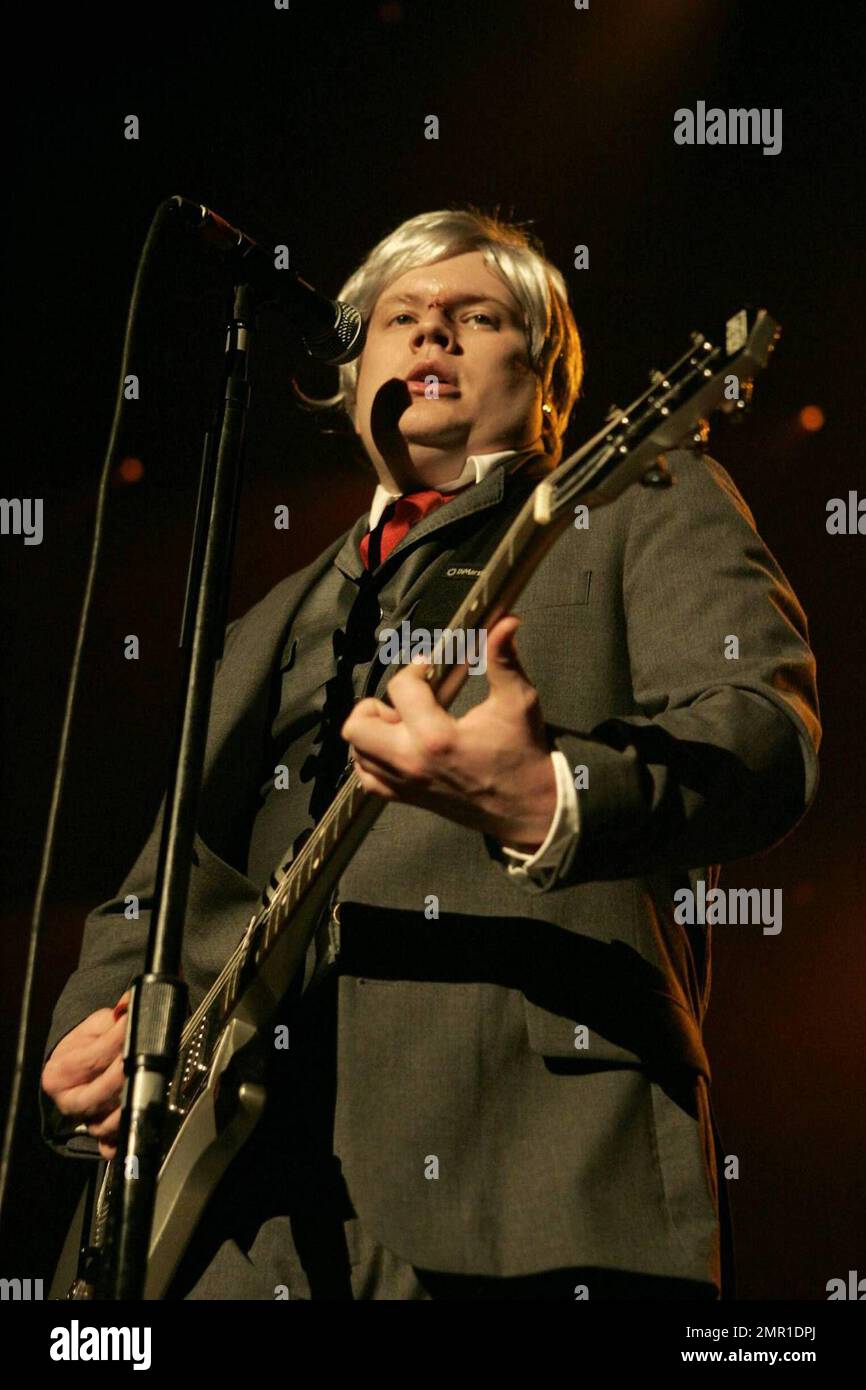 Fall Out Boy appear to be made up to look beaten up as they perform at ...