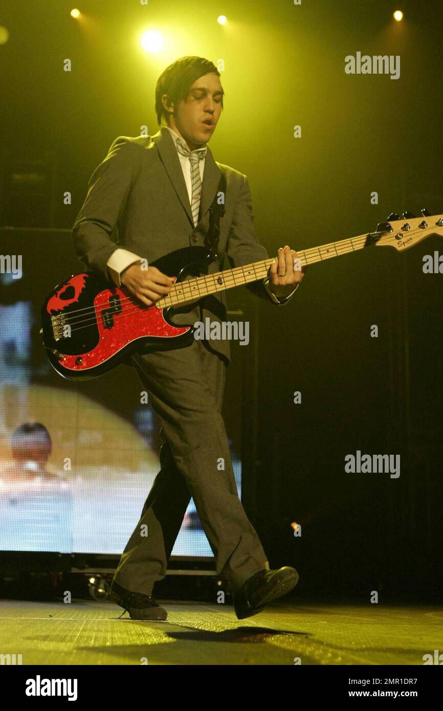 Fall Out Boy appear to be made up to look beaten up as they perform at ...