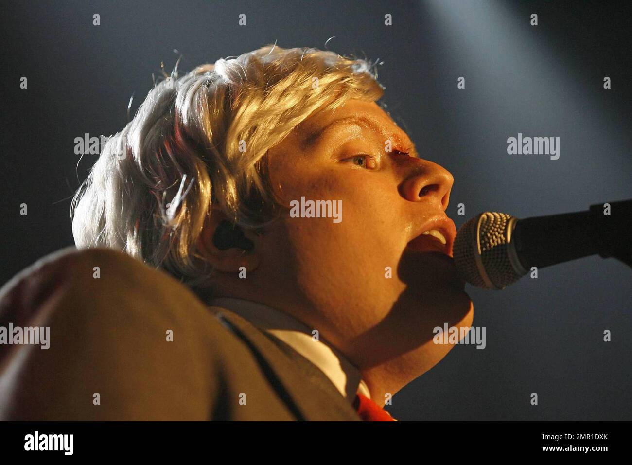 Fall Out Boy appear to be made up to look beaten up as they perform at ...