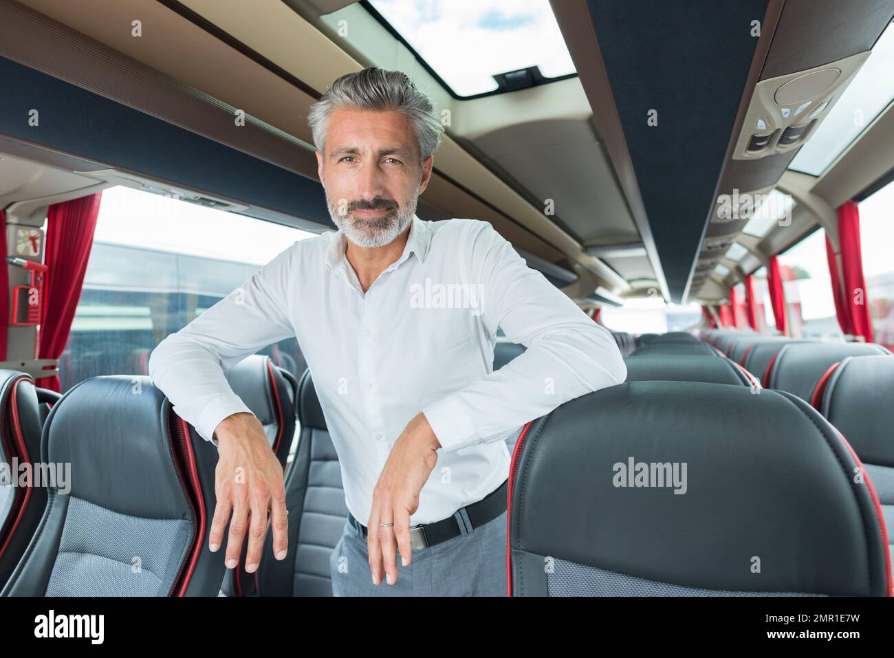 portrait of a bus driver Stock Photo - Alamy