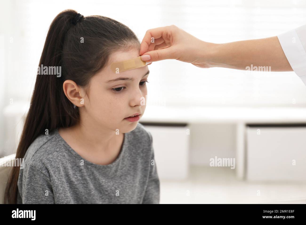 Forehead bandage hi-res stock photography and images - Alamy