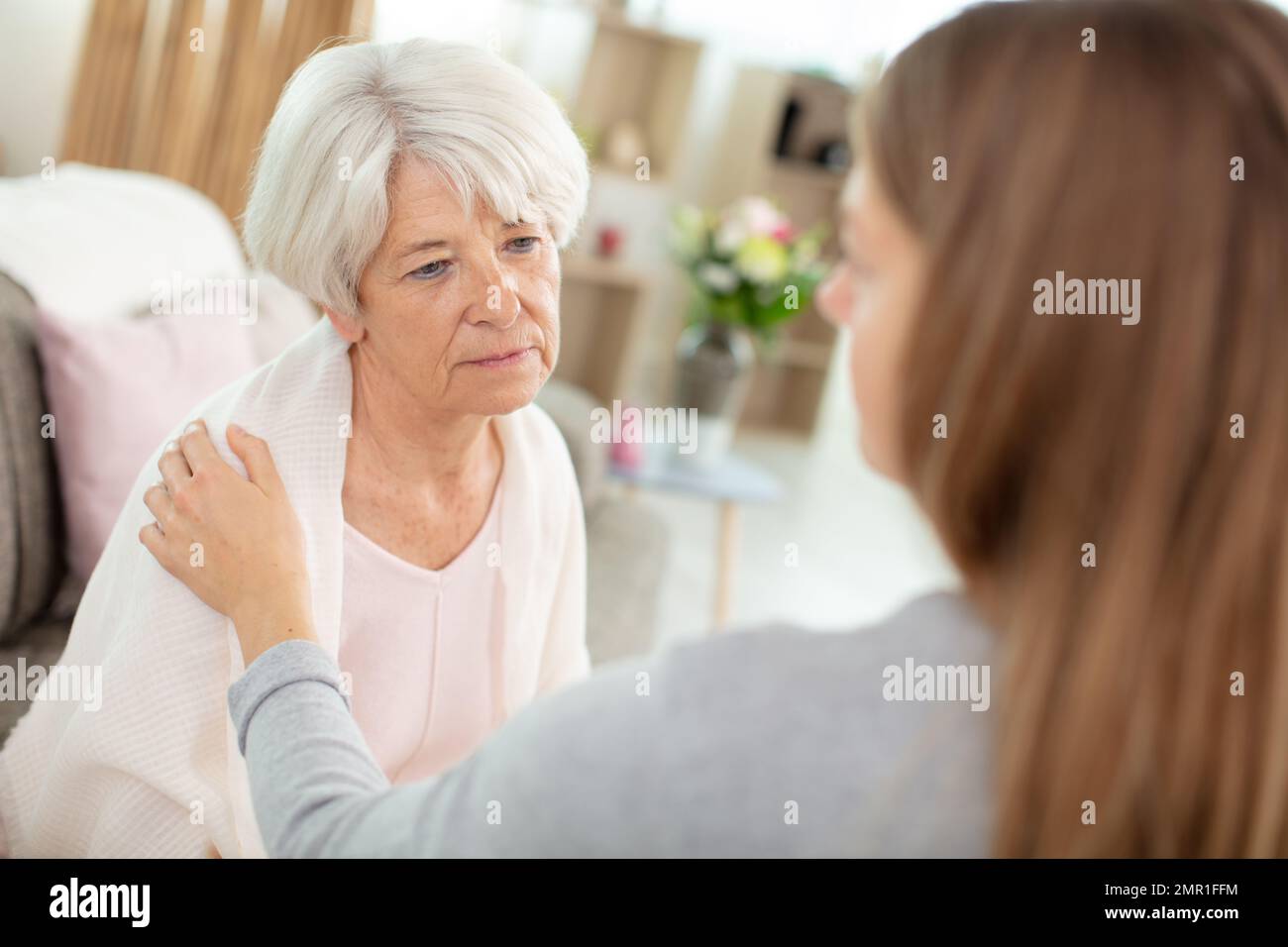 grown up daughter soothe aged mother feel empathy Stock Photo - Alamy