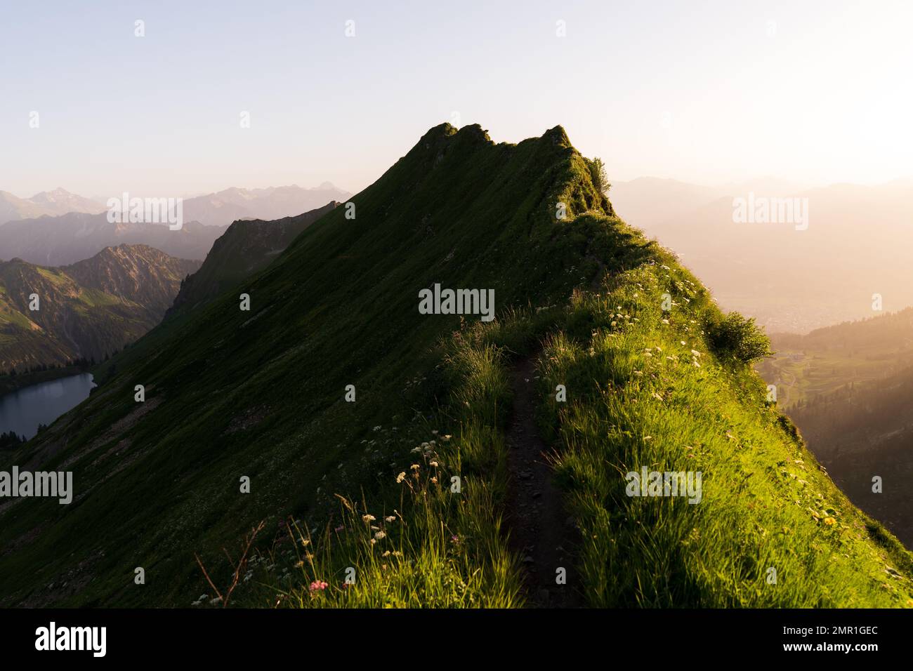 An aerial view of greenery mountain landscape with lake Stock Photo - Alamy