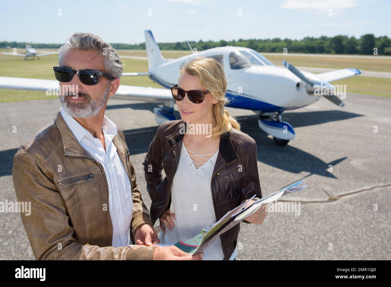 Businessman airplane tarmac hi-res stock photography and images - Alamy
