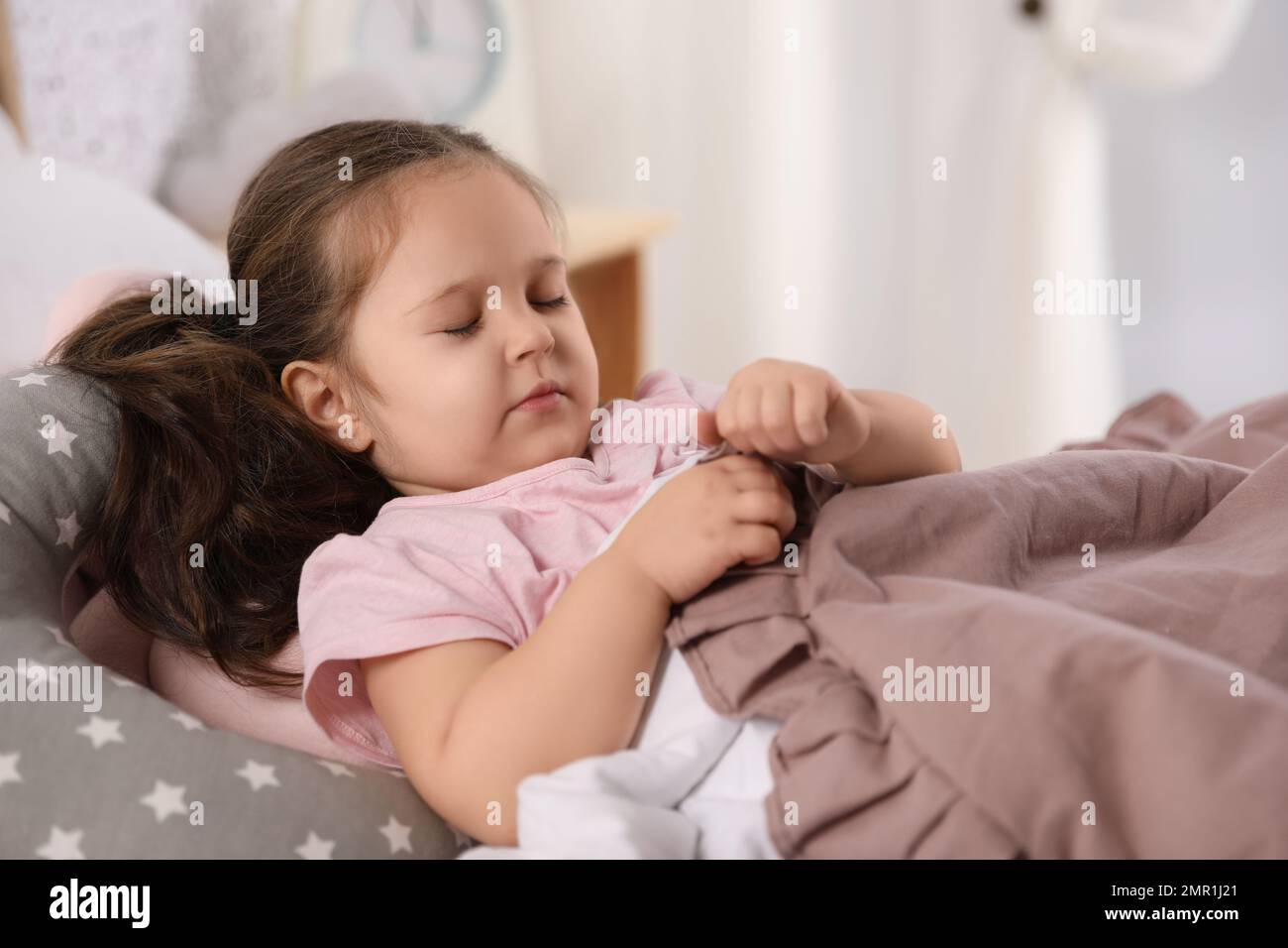 Cute little girl sleeping at home. Bedtime schedule Stock Photo - Alamy