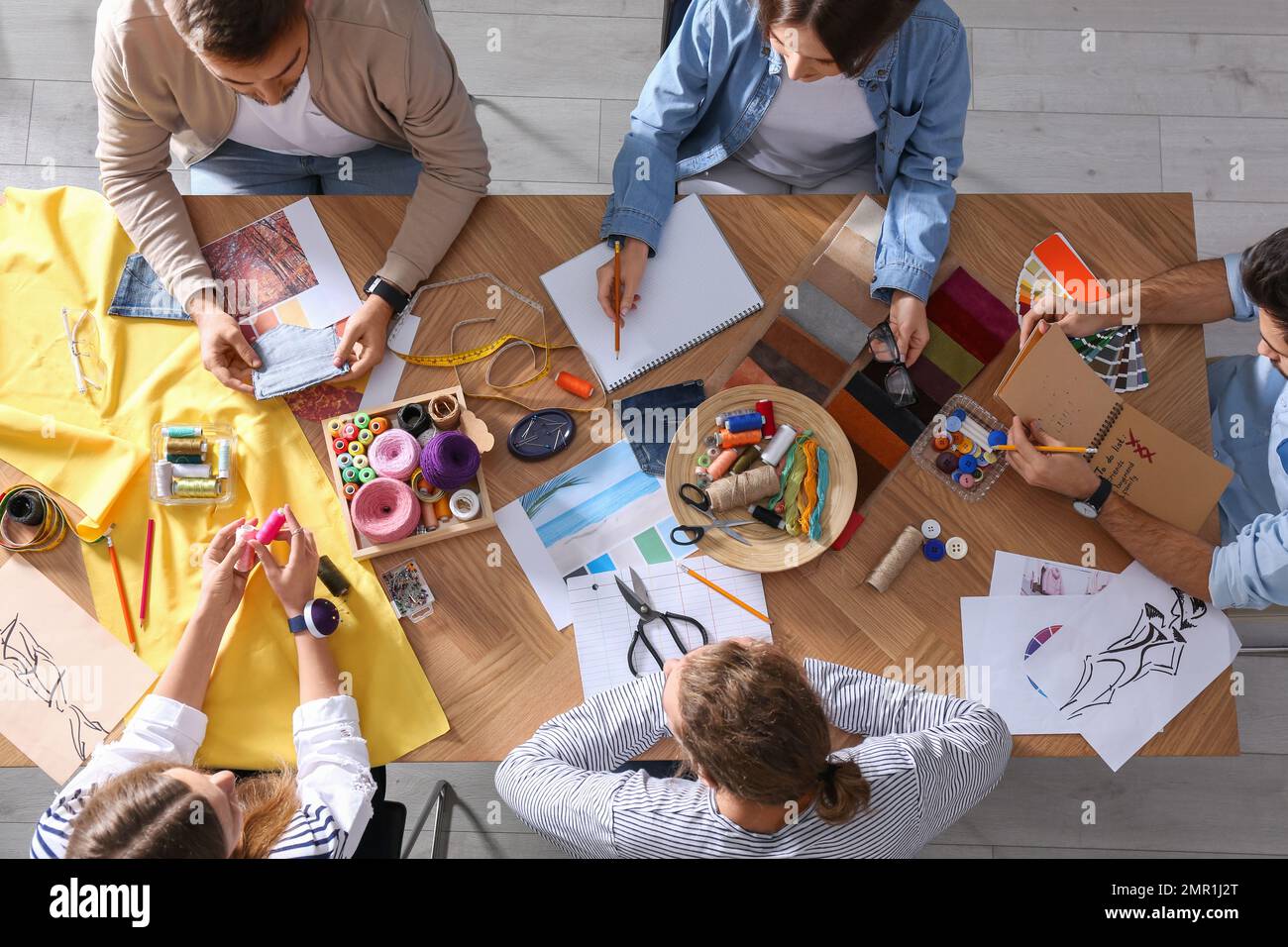 Fashion designer creating new clothes in studio, top view Stock Photo ...